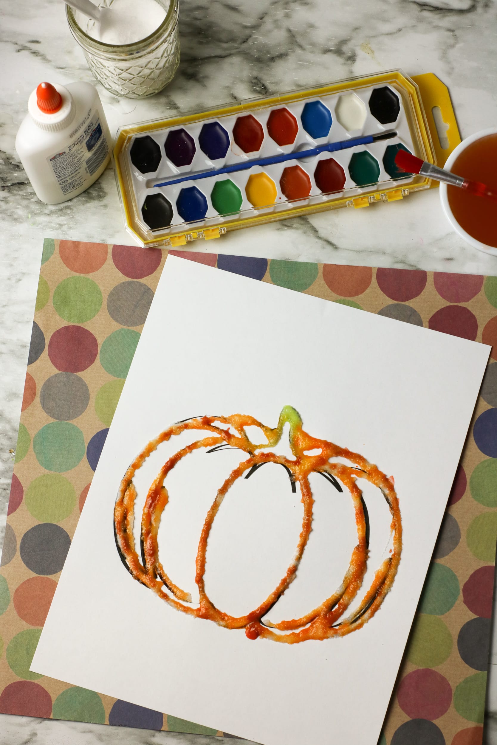 Pumpkin Watercolor Salt Painting For Kids (Free Pumpkin Template)